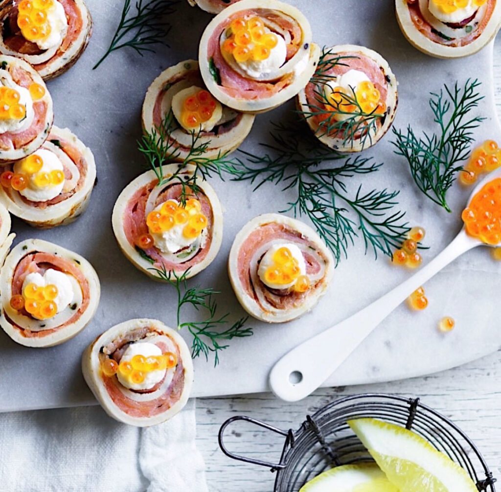 Smoked salmon roulade with crème fraiche and salmon pearls - Simmone Logue